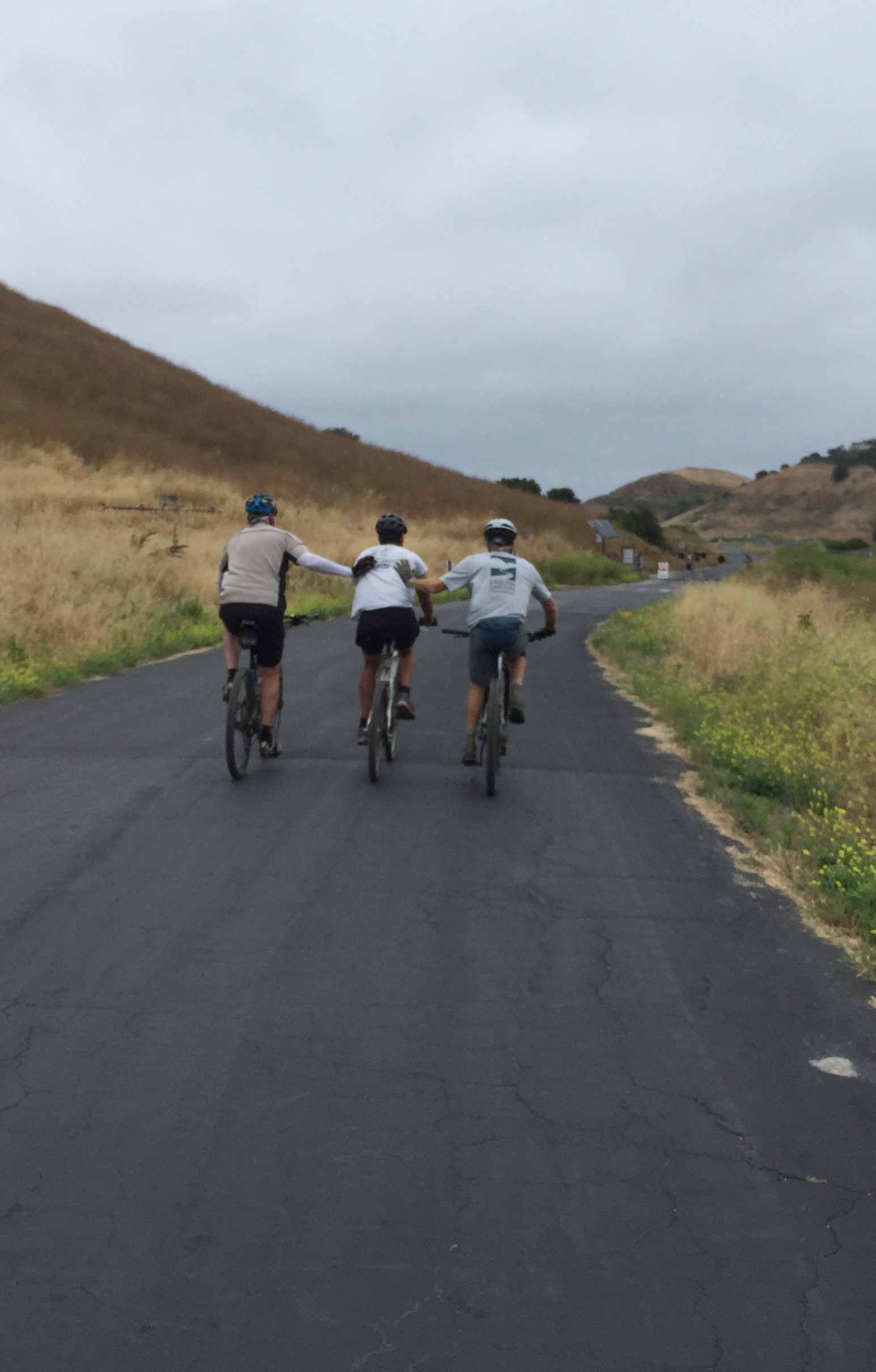 mtn bike larry andre helping – Laguna Canyon Foundation